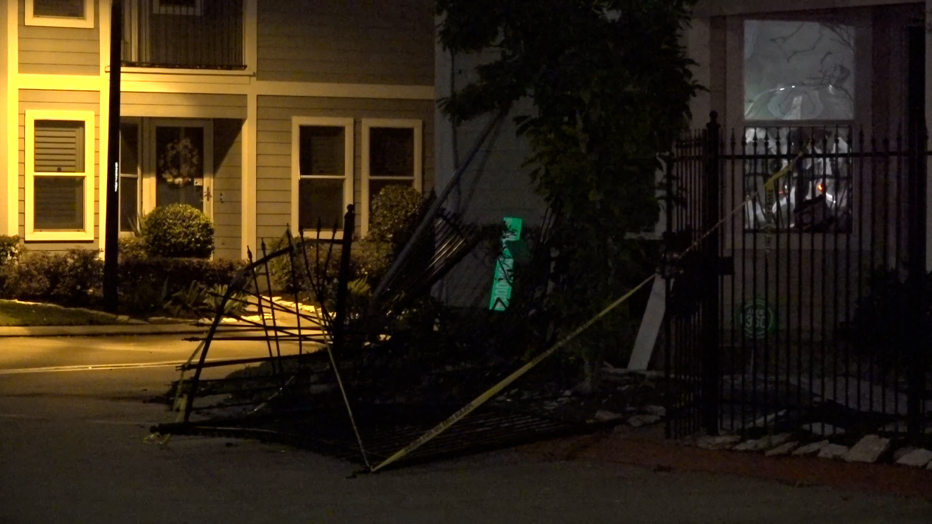 Driver crashes into gate; stabs man on the ground multiple times before ...