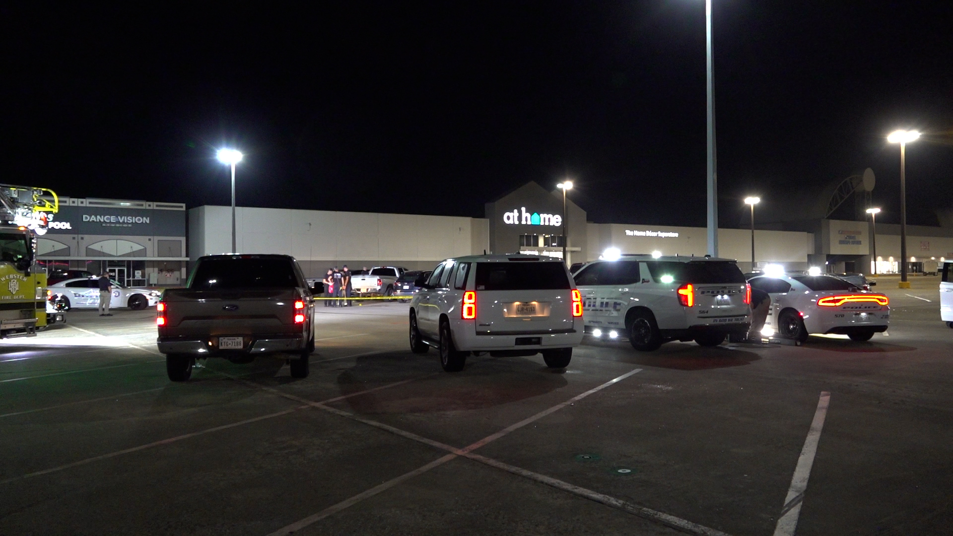 Woman found dead in Webster shopping center parking lot with several ...
