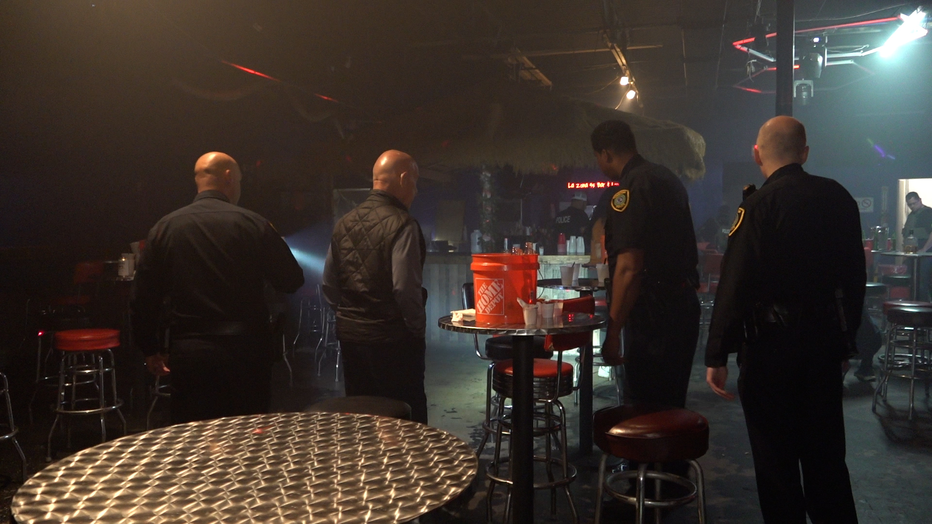 Police arrest about 20 during raid at two after-hours clubs in ...
