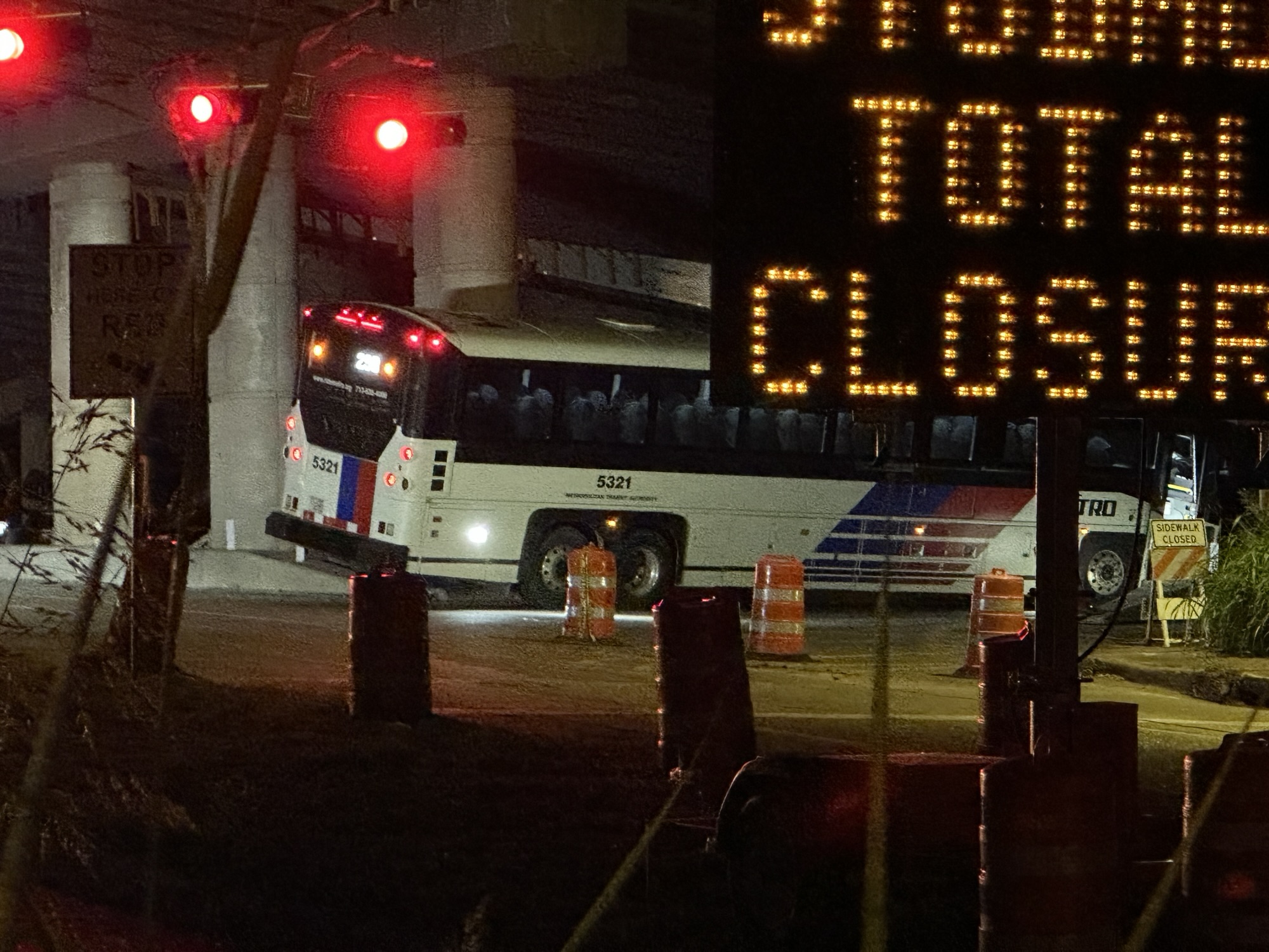 Metro bus gets stuck under I-10 bridge in construction zone - Houston ...